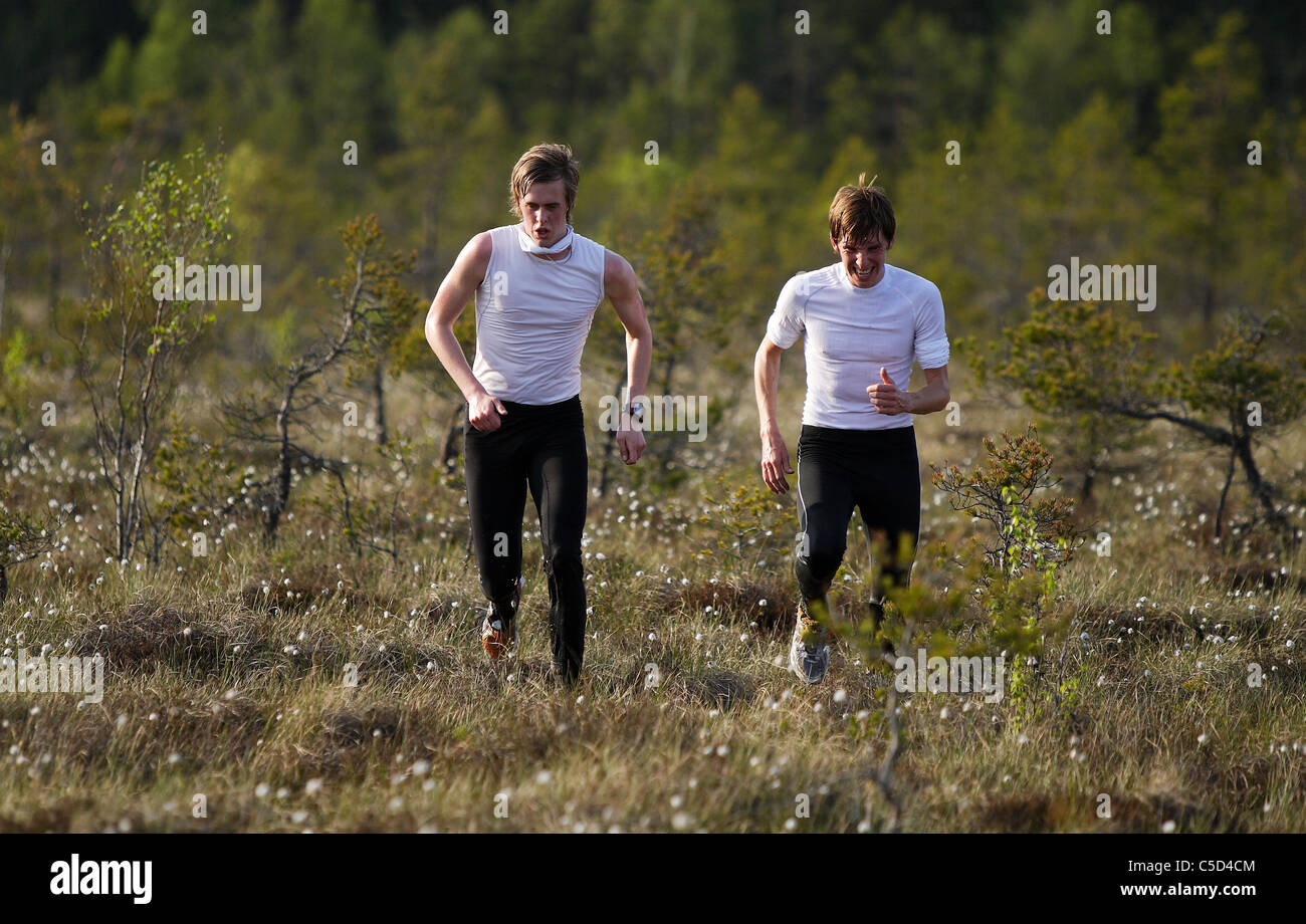 Two boys running hi-res stock photography and images - Alamy
