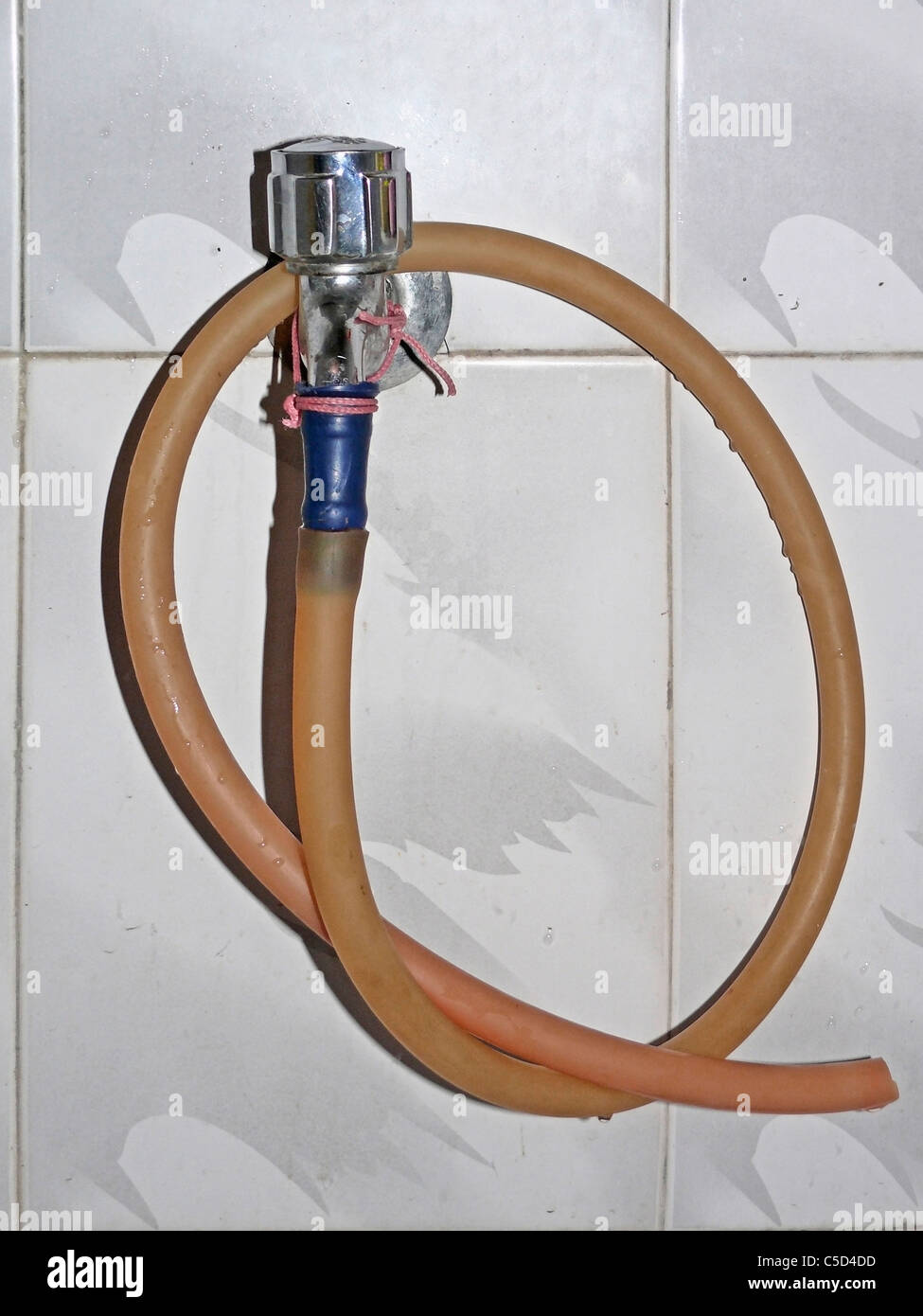 Water pipe with rubber pipe Stock Photo - Alamy