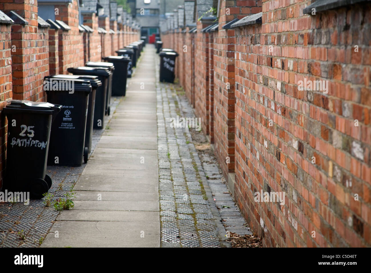 Rubbish bins in back alley hi-res stock photography and images - Alamy