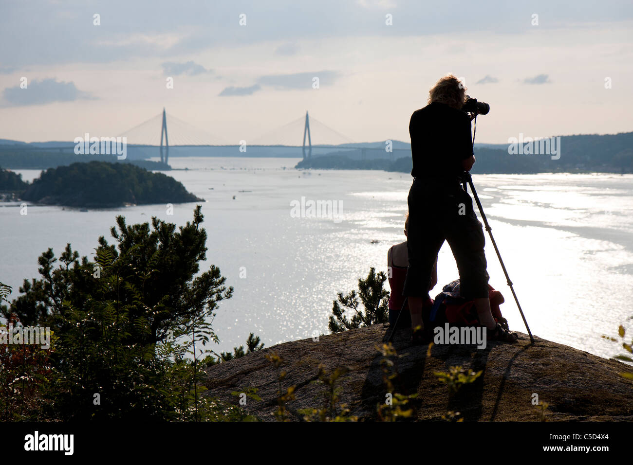 Rear view man photographing nature hi-res stock photography and images ...