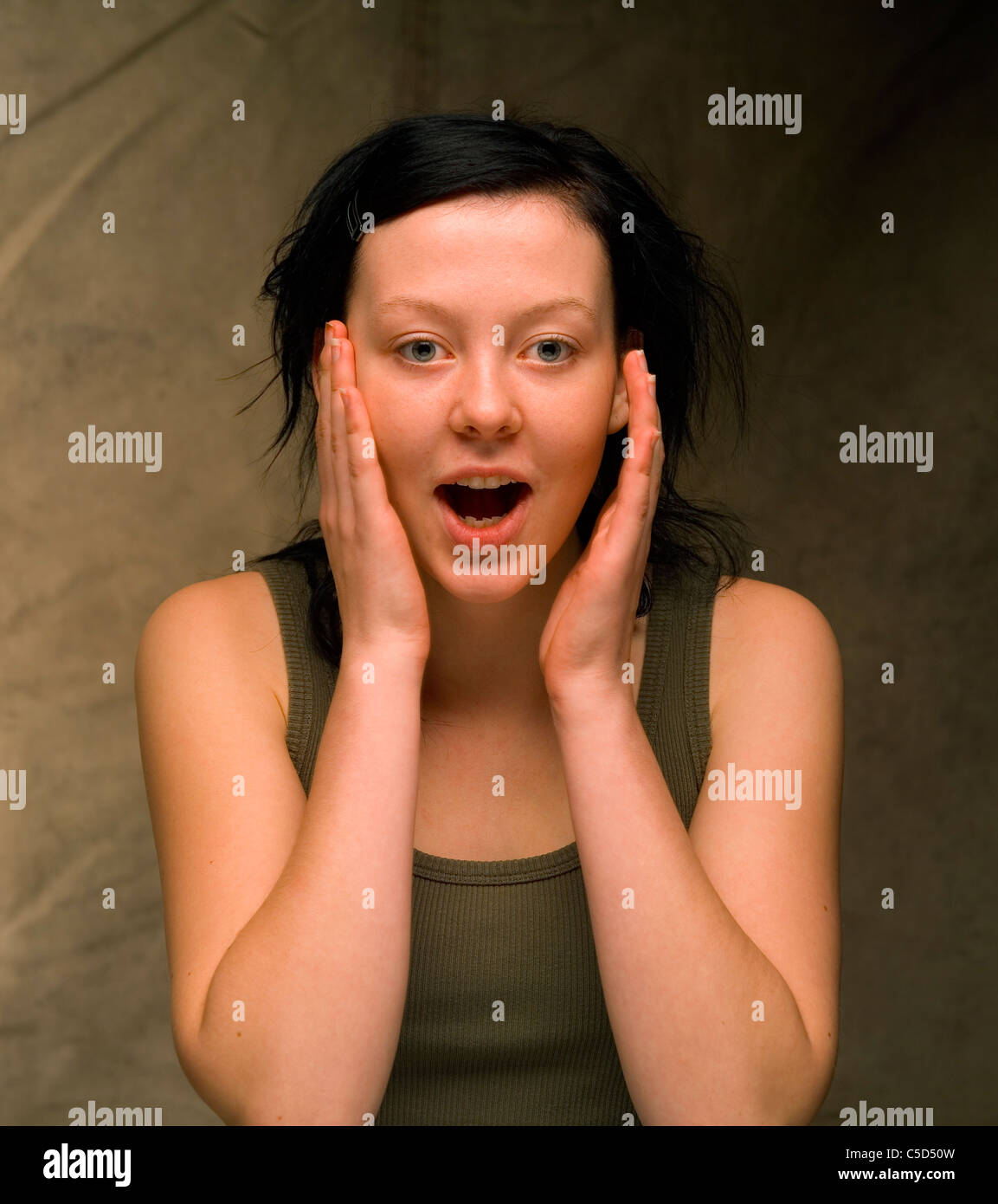 Hands Cheeks Mouth High Resolution Stock Photography and Images - Alamy