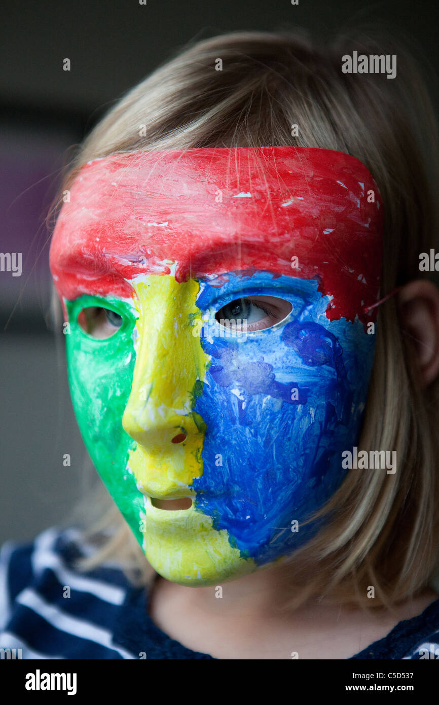 Girl wearing a carnival mask hi-res stock photography and images - Alamy