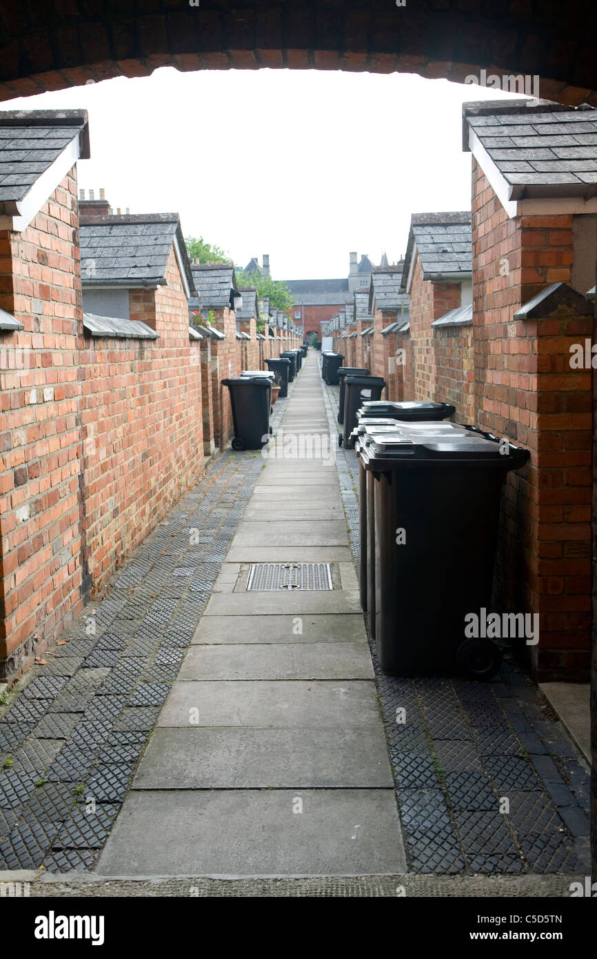Rubbish bins in back alley hi-res stock photography and images - Alamy
