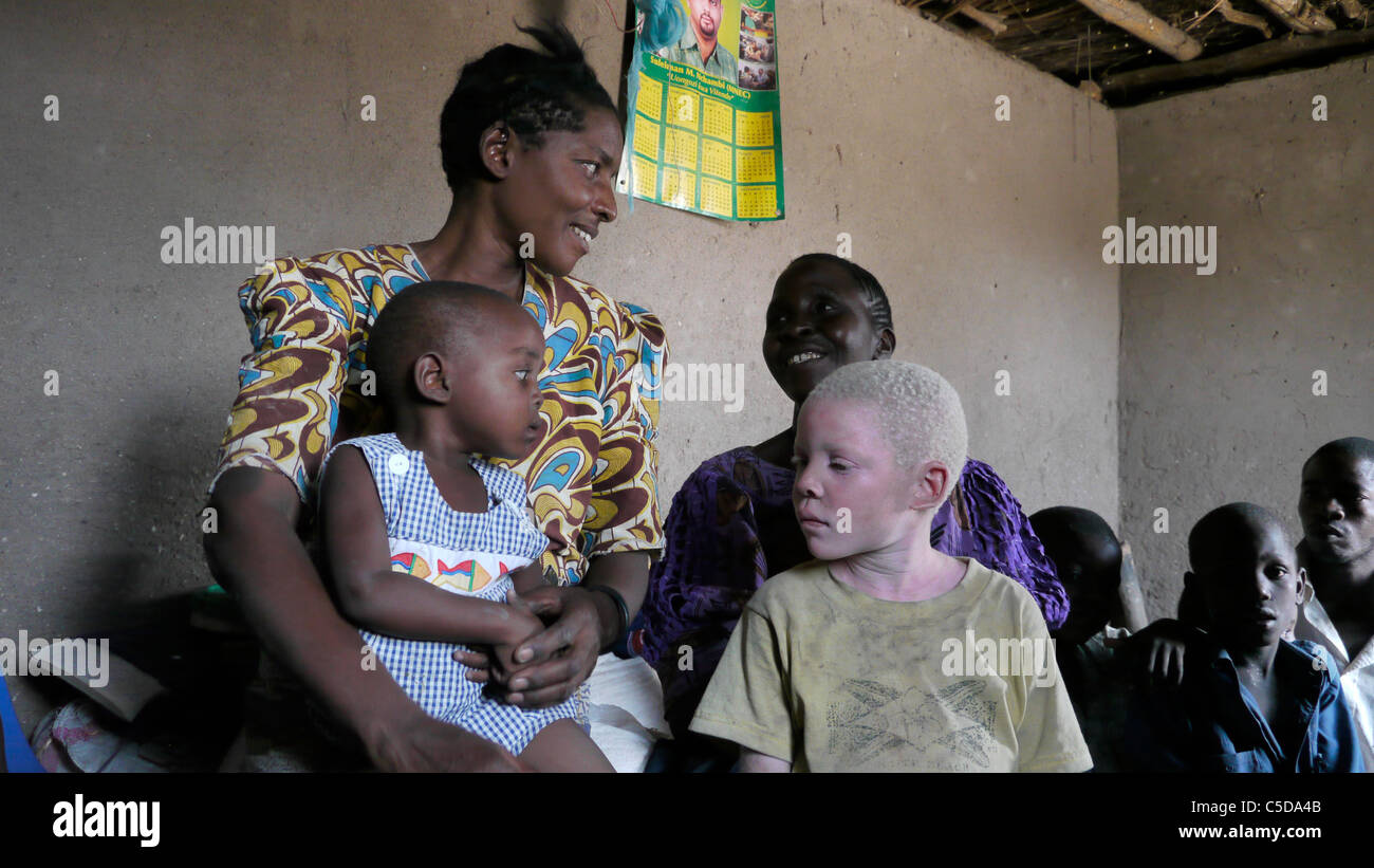 TANZANIA Village of Mwamalasa, Shinyanga. Group of mothers and children ...