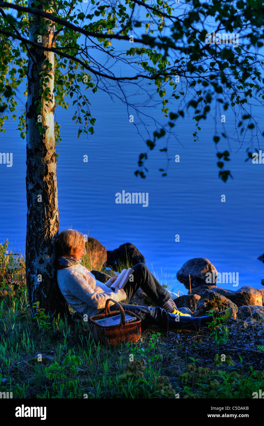 Book by a lake hi-res stock photography and images - Alamy