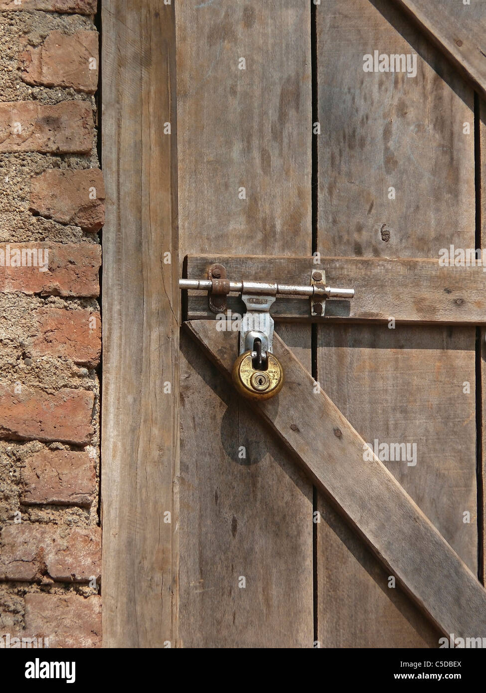 Close up of locked wooden door Stock Photo - Alamy