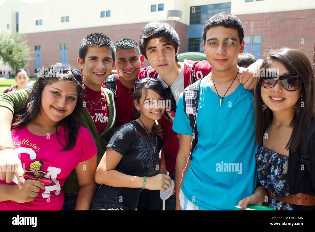 Group of Hispanic friends pose for picture in between class at South ...