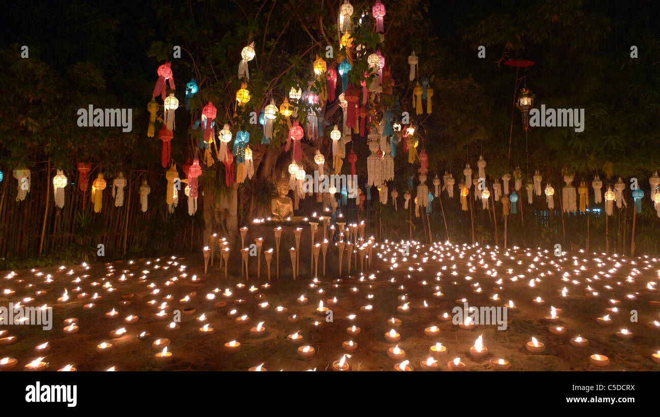 THAILAND Chiang Mai. Loi Krathong lantern Festival. Candle lit shrine ...