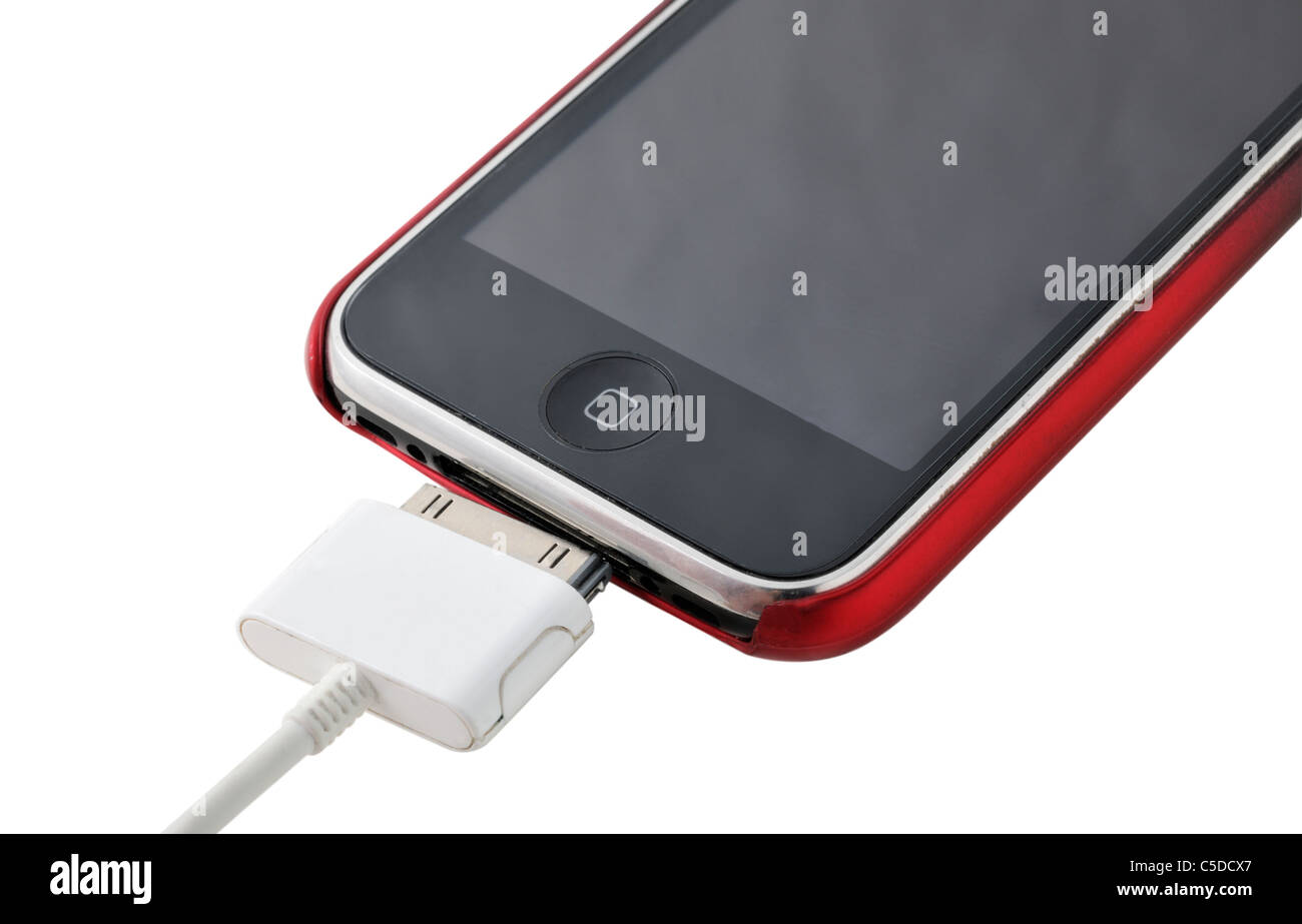 Plugging charger into mobile telephone hi-res stock photography and ...