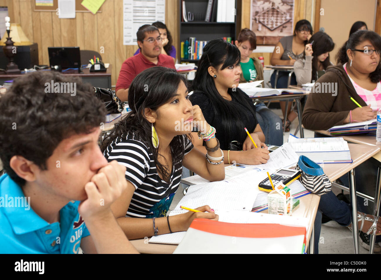 Students in a predominantly Hispanic area of South Texas listen during ...