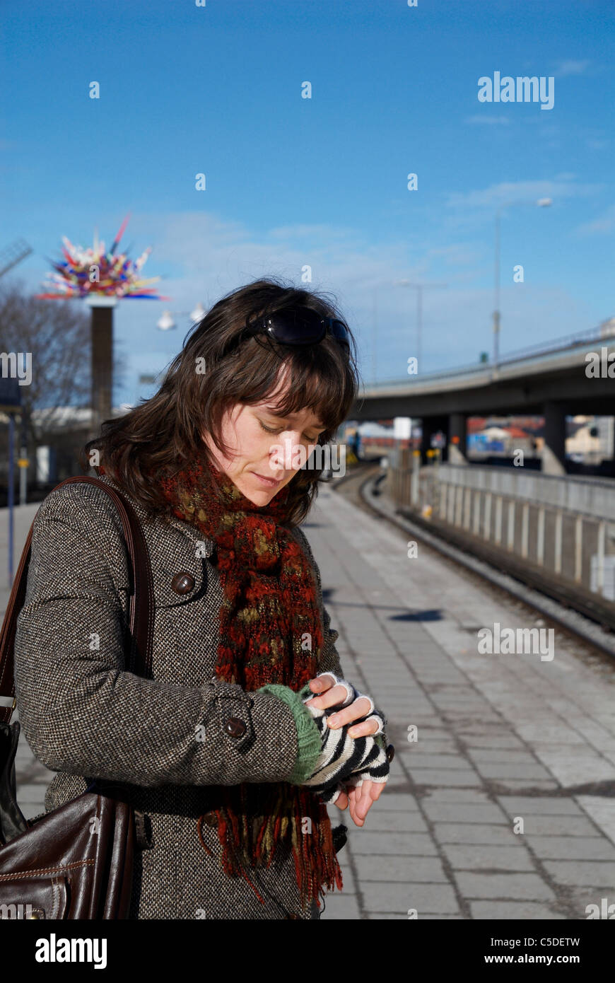 Commuter waiting train hi-res stock photography and images - Alamy