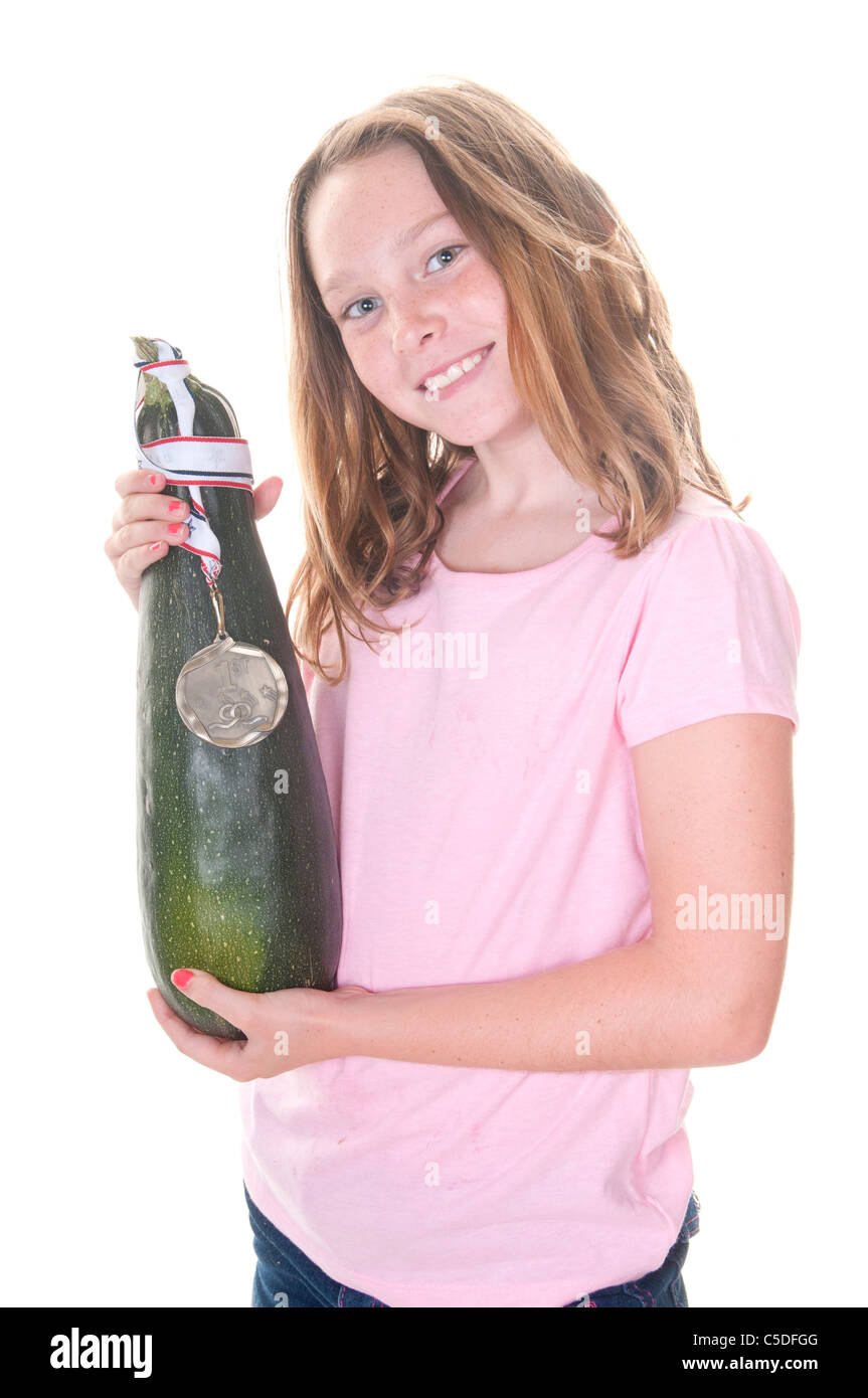Girl with award winning zucchini Stock Photo - Alamy