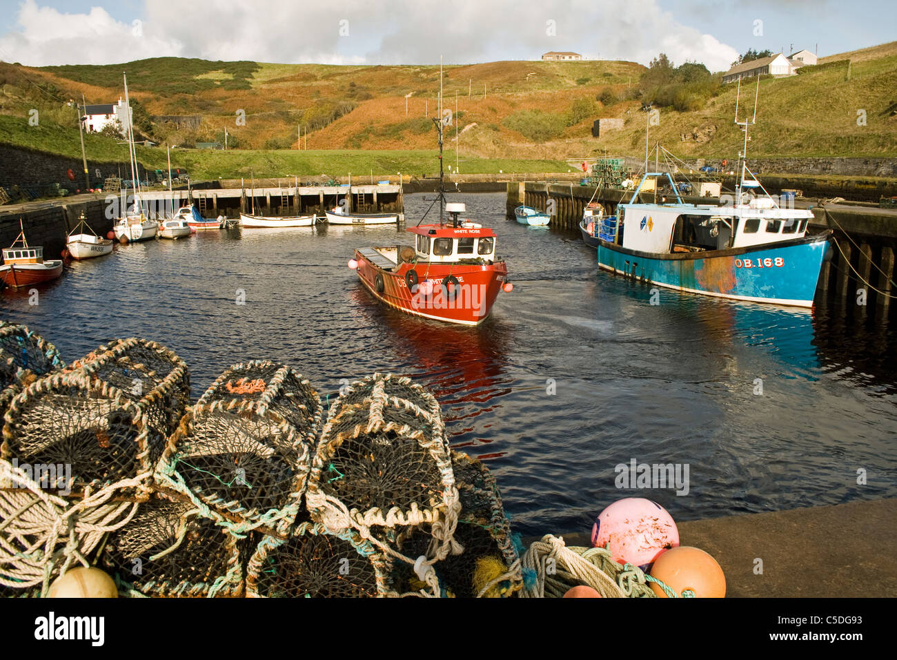 quiet fishing harbour Stock Photo - Alamy