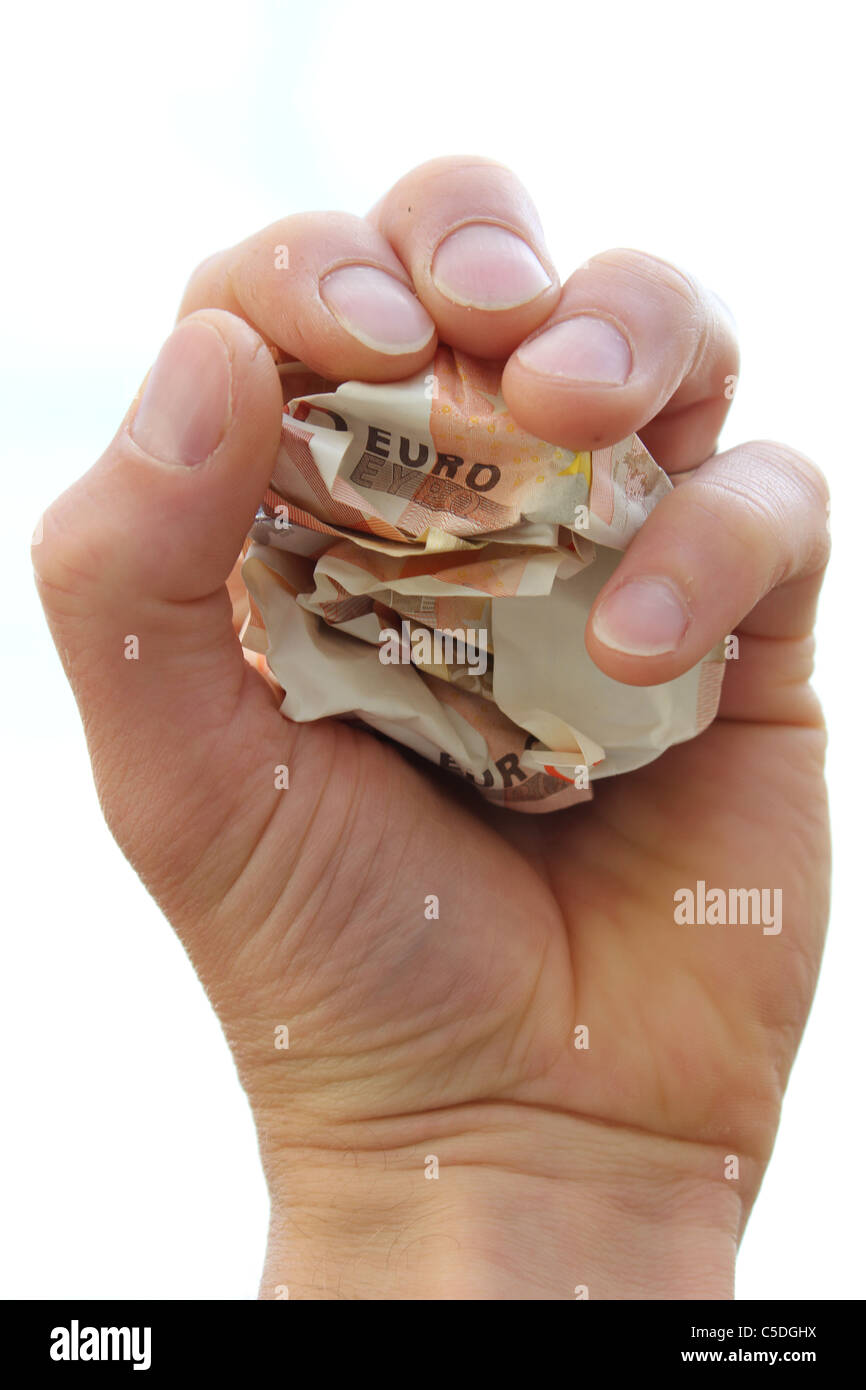 a hand crumples a couple of 50 euro notes Stock Photo - Alamy
