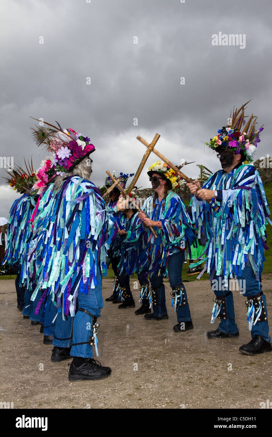 Exmoor Border Morris Dancers, black-faced, wearing long flowing torn ...