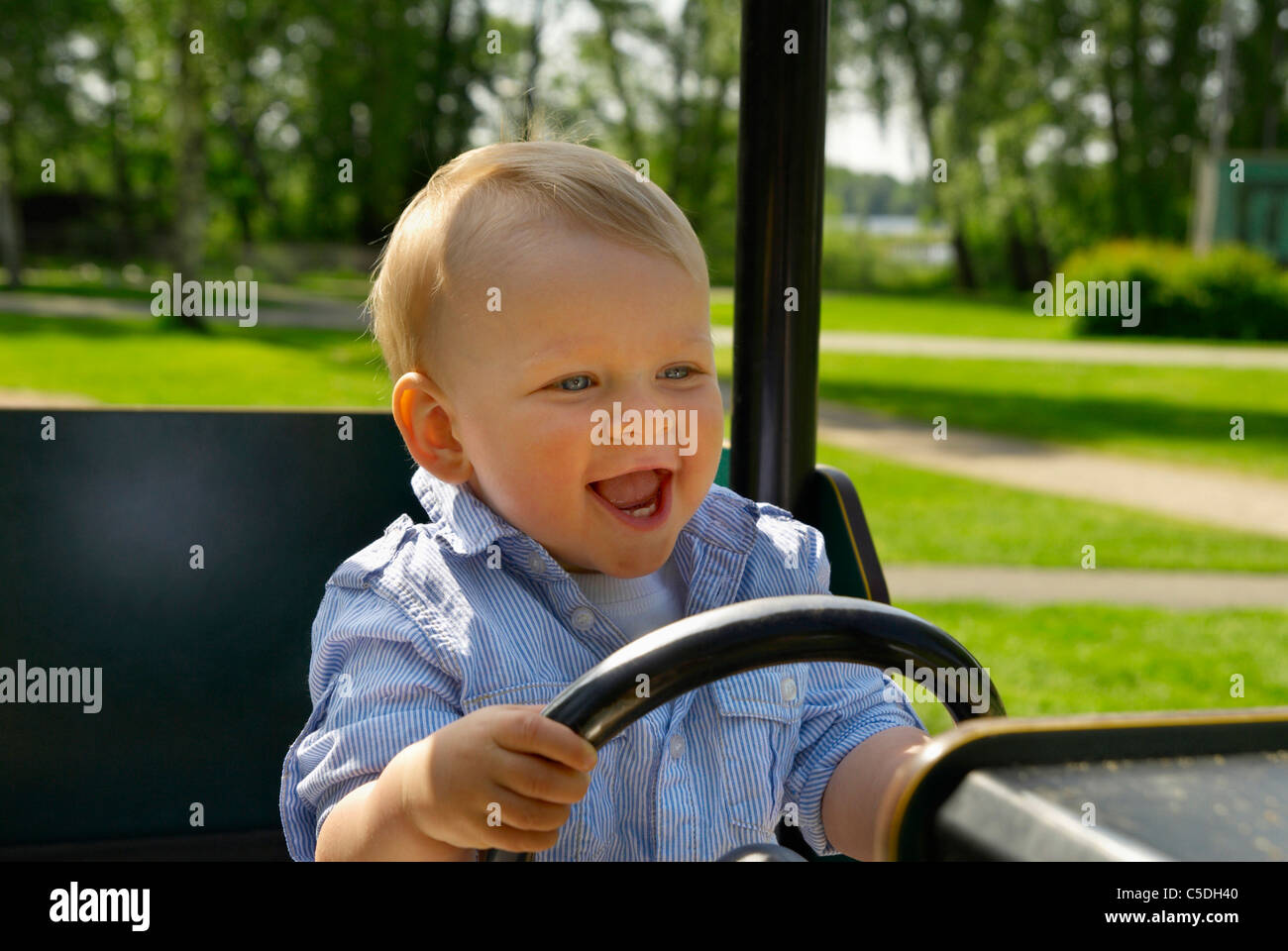 Child Driving Toy Stock Photos & Child Driving Toy Stock Images - Alamy