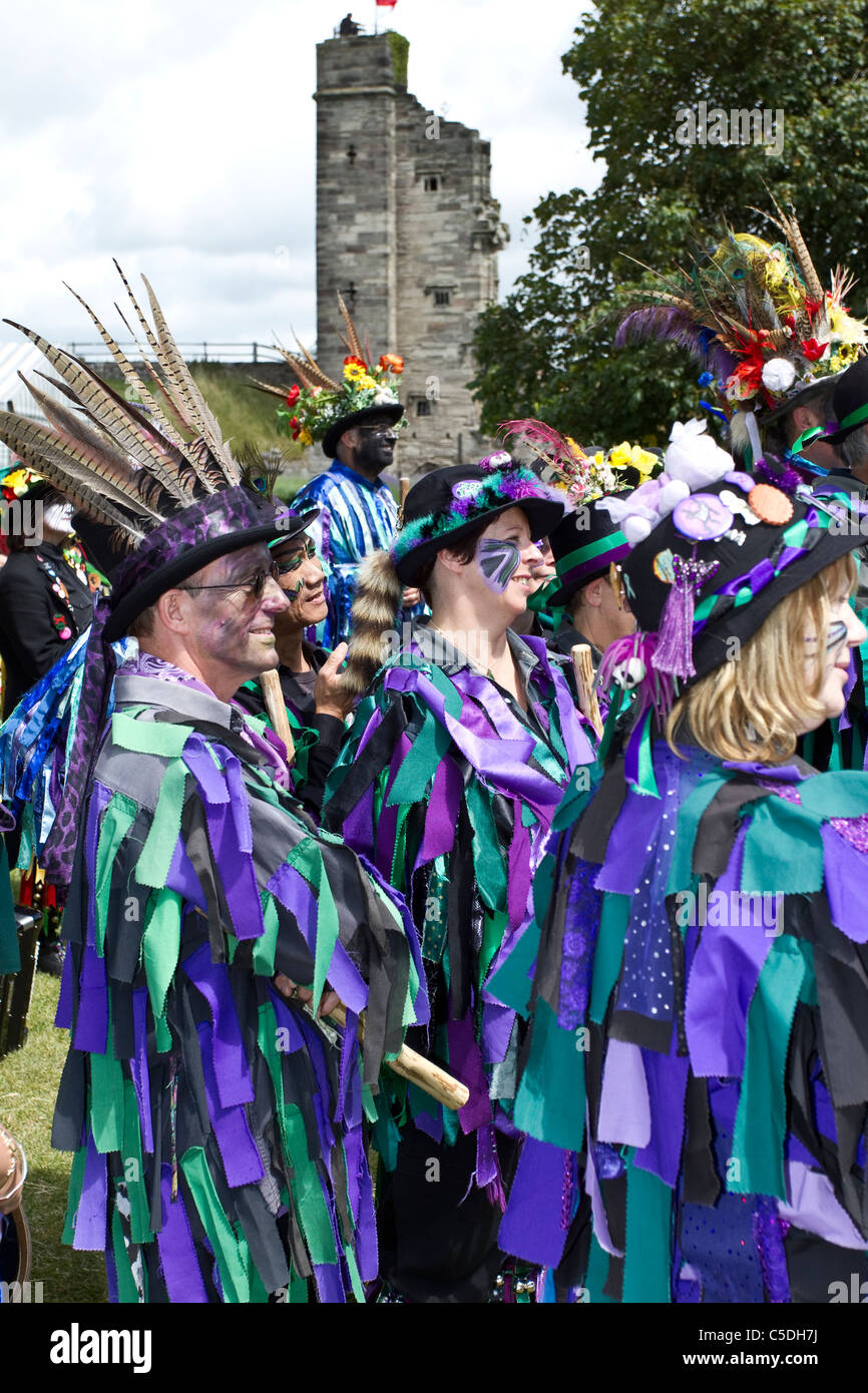 Exmoor Border Morris Dancers, black-faced, wearing long flowing torn ...