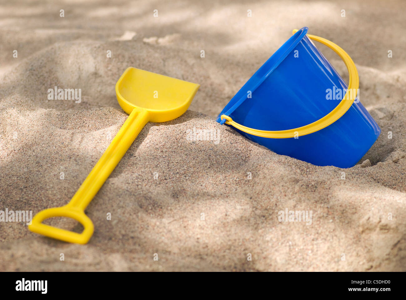 Toys in a sandpit hi-res stock photography and images - Alamy