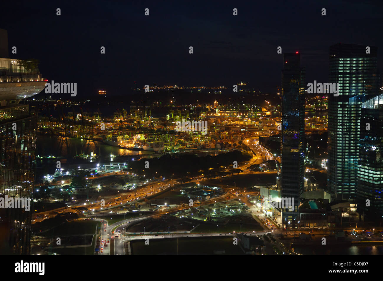 View on Singapore's busy port at night Stock Photo - Alamy