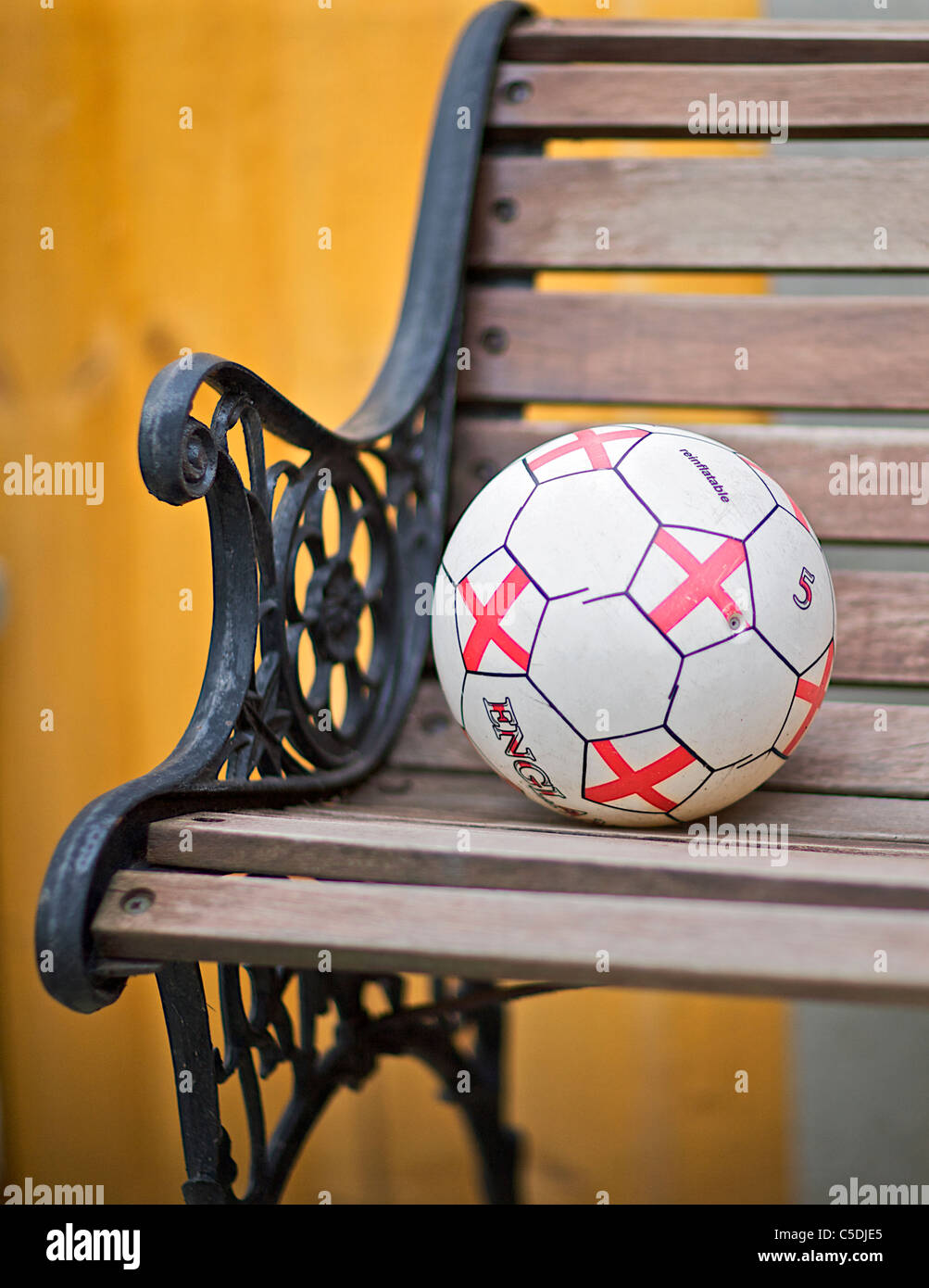 old bench with plastic football Stock Photo - Alamy