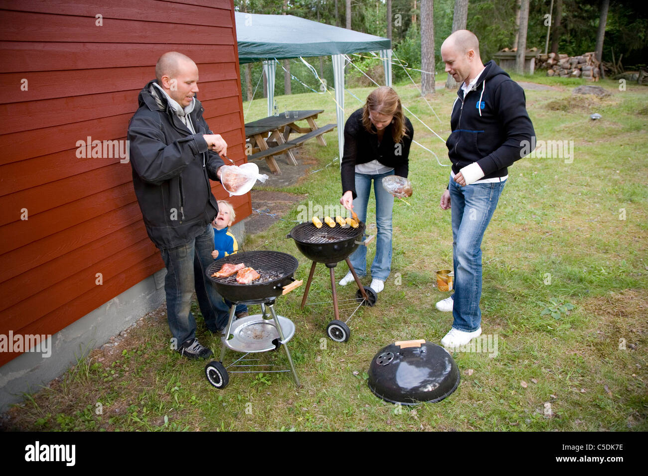 Three friends barbecue party in hi-res stock photography and images - Alamy