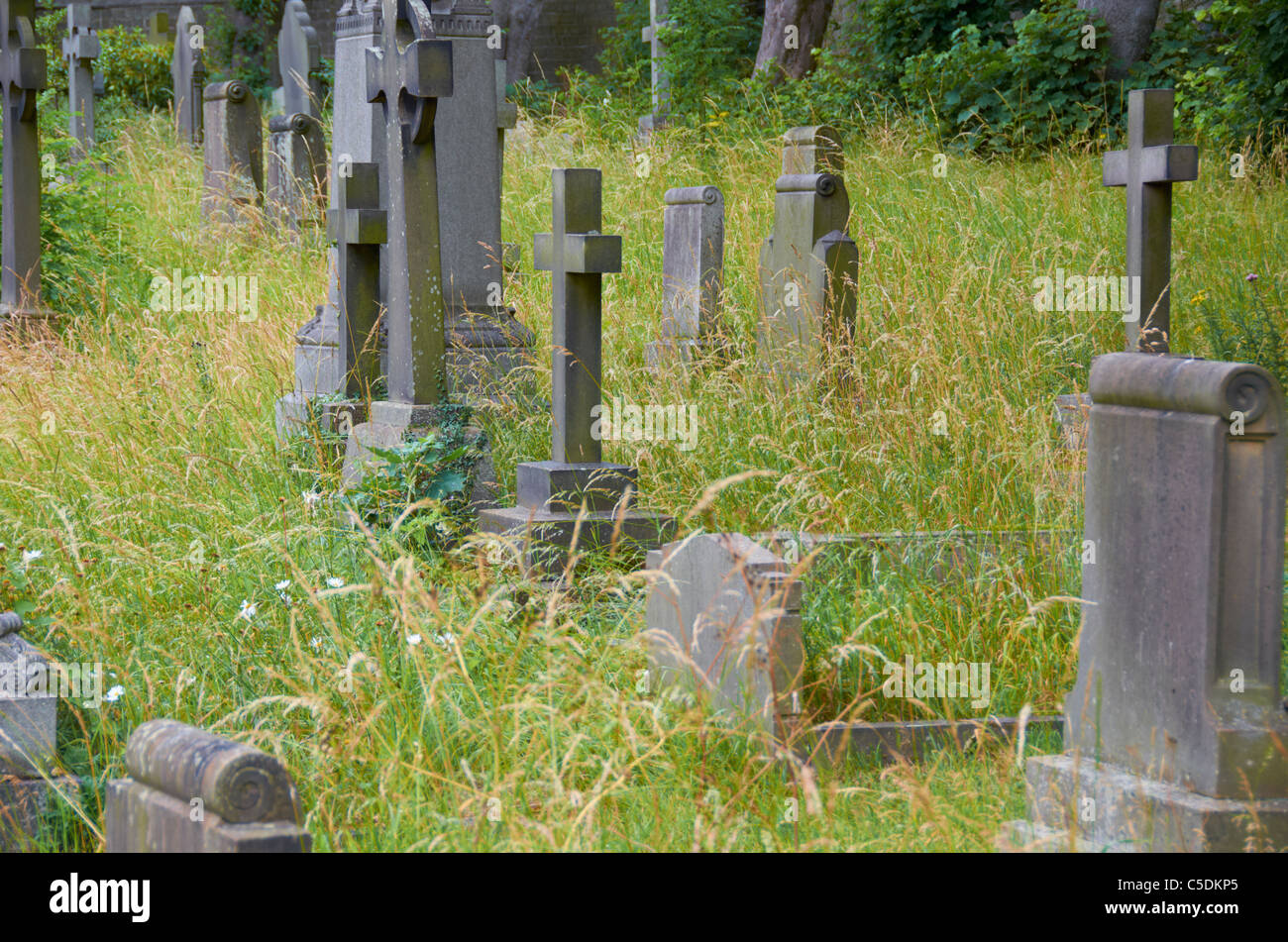 Graveyard in a village graveyard Stock Photo - Alamy