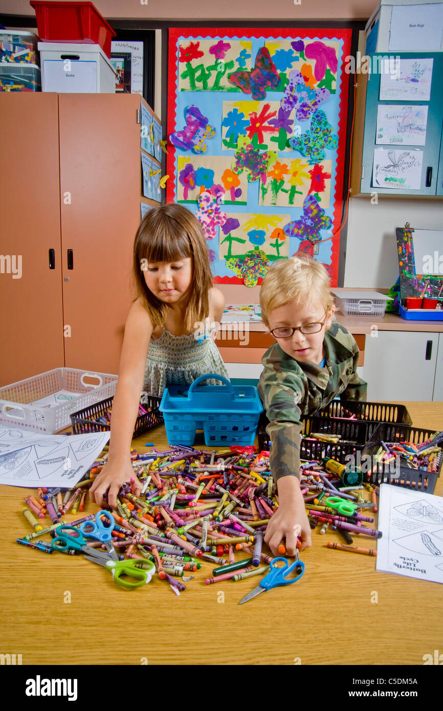 Kindergarten children in San Clemente, CA, collect and organize a table ...
