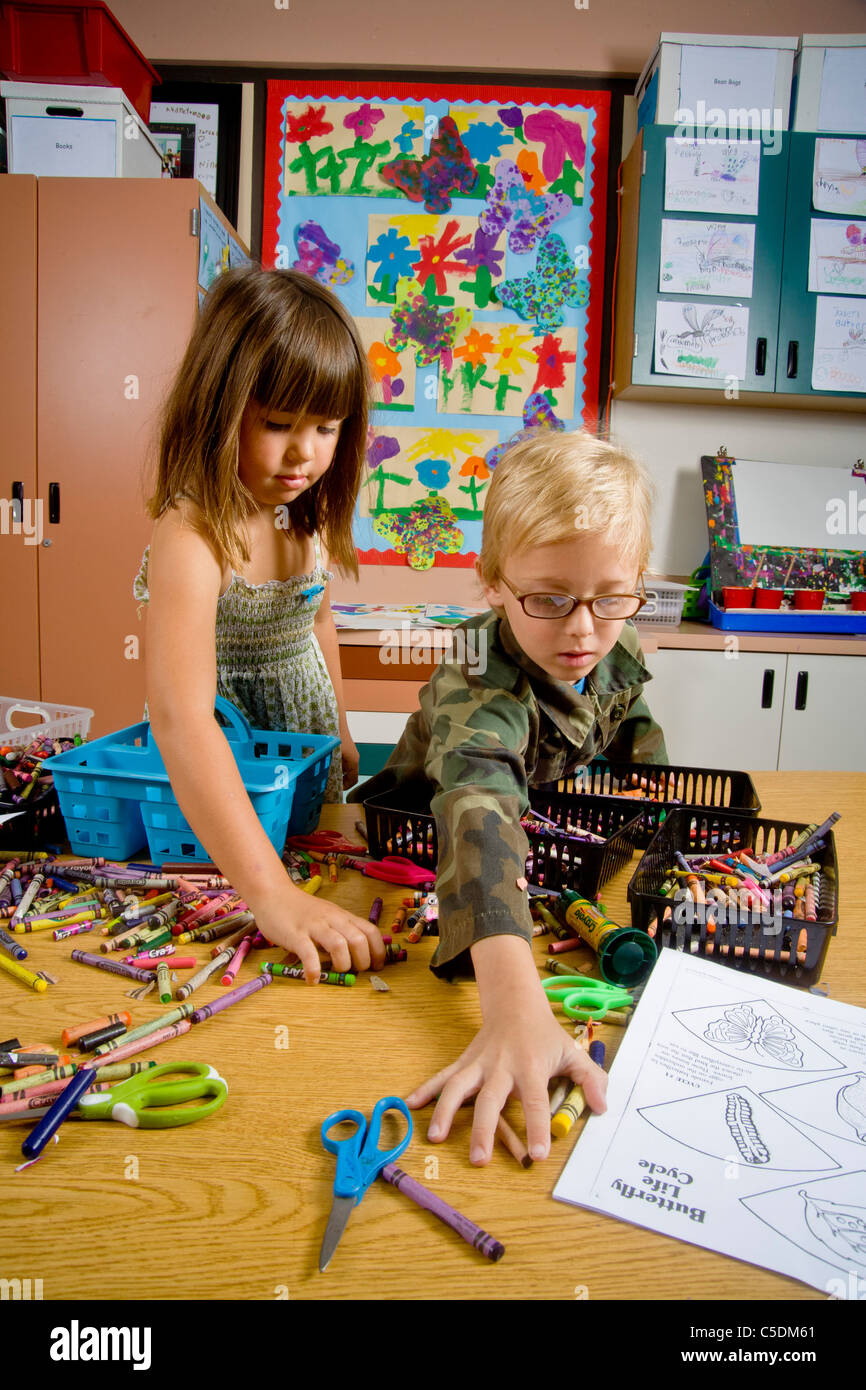Kindergarten children in San Clemente, CA, collect and organize a table ...