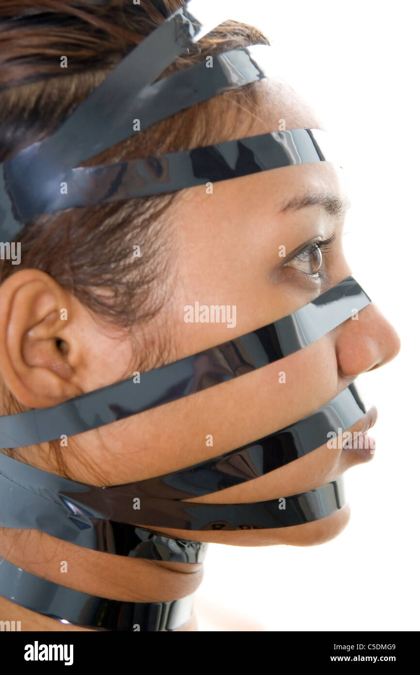 woman has a bandaged face with black tape Stock Photo - Alamy