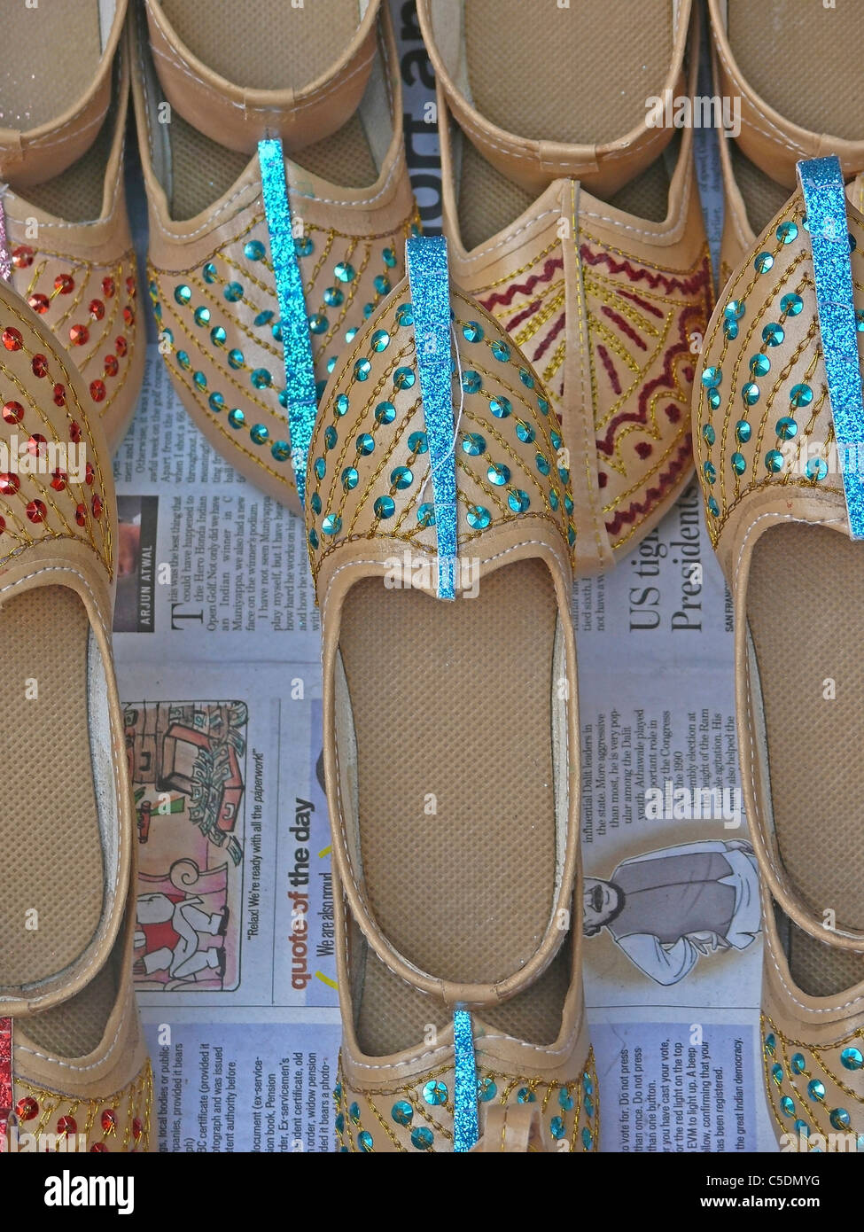 Traditional shoes india hi-res stock photography and images - Alamy