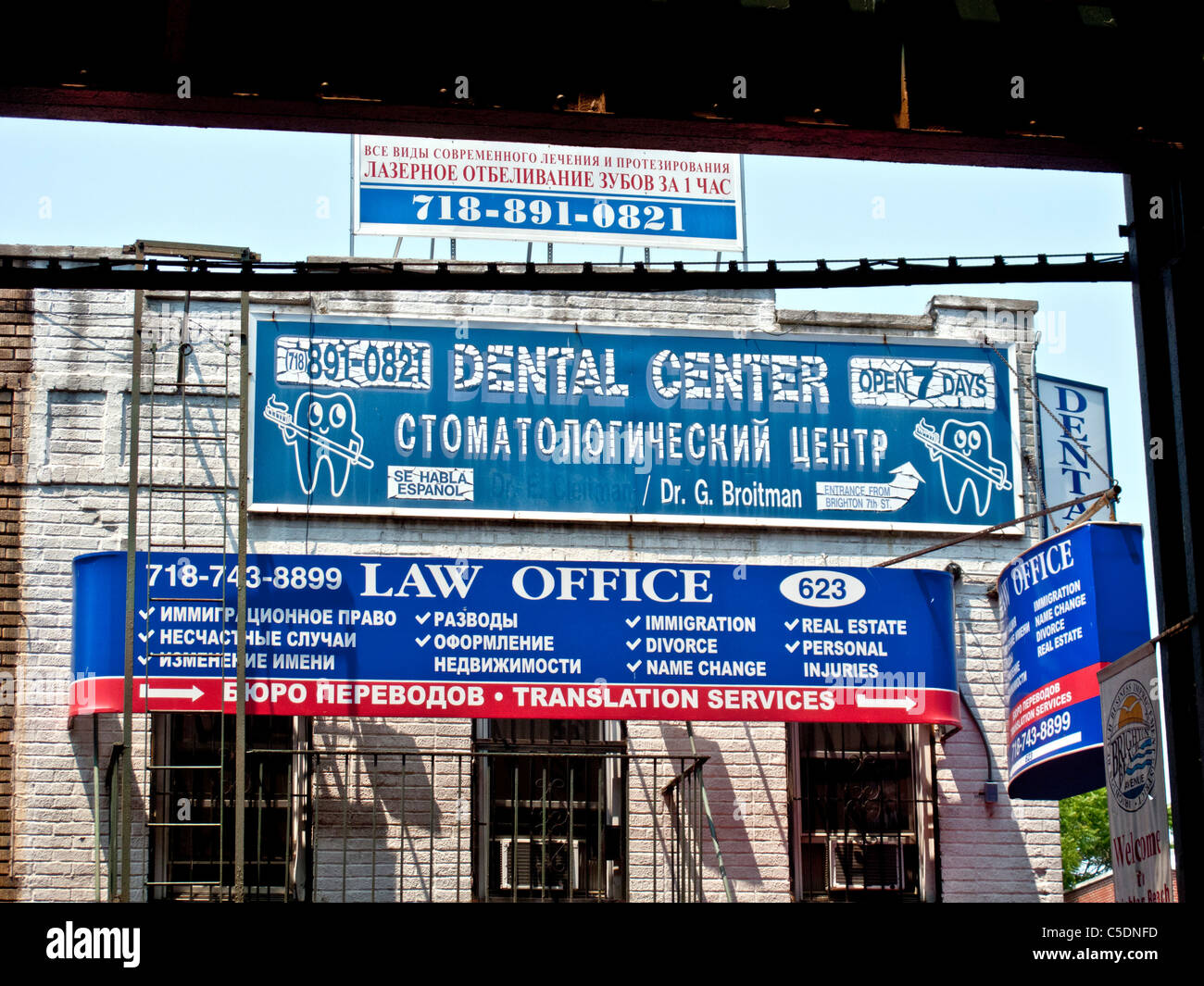 Bilingual business signs in English and Russian in the "Little Odessa ...