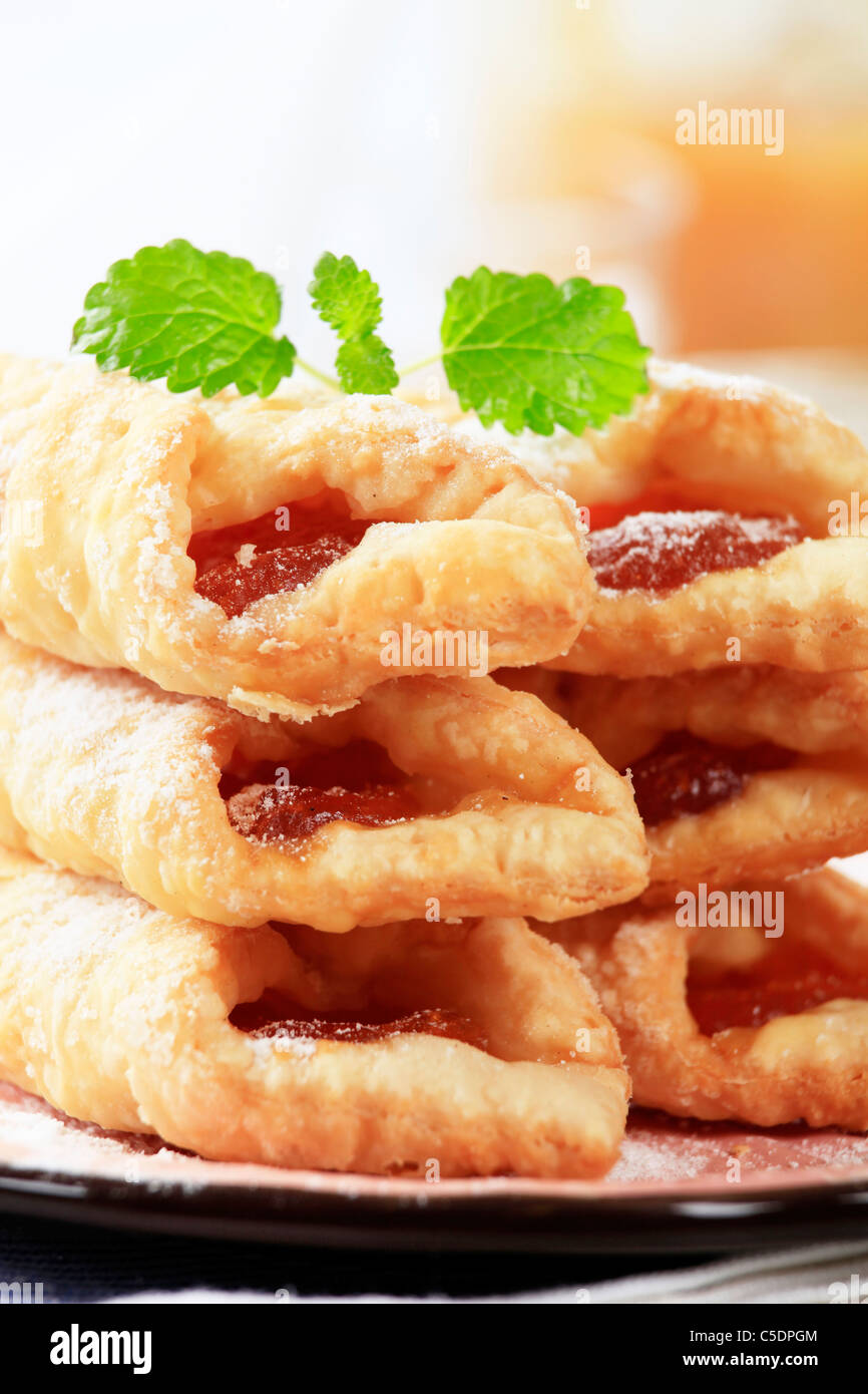 Puff pastries filled with jam - closeup Stock Photo - Alamy
