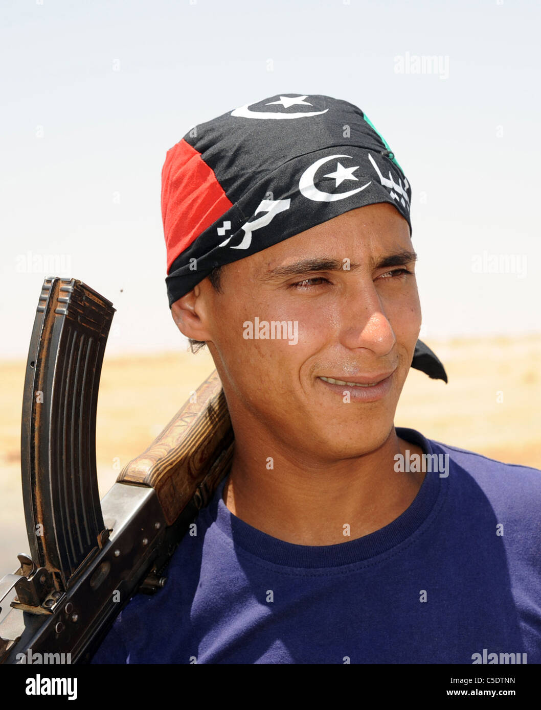 A civil war between Gaddafi army and Libya's Transitional National Council army with air support ...