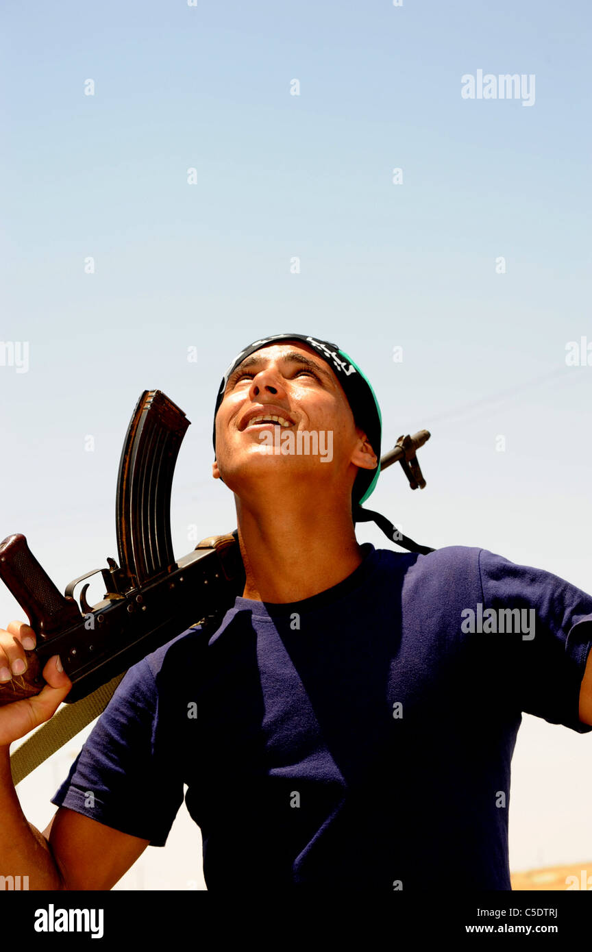 A civil war between Gaddafi army and Libya's Transitional National Council army with air support ...