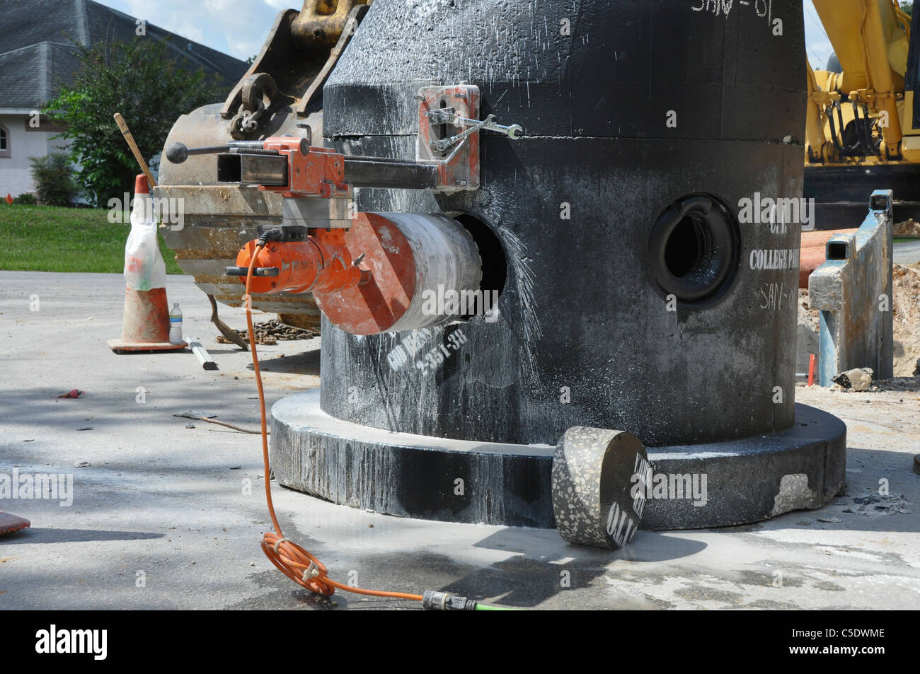 Concrete Core Drilling a santary manhole for an additional service line ...