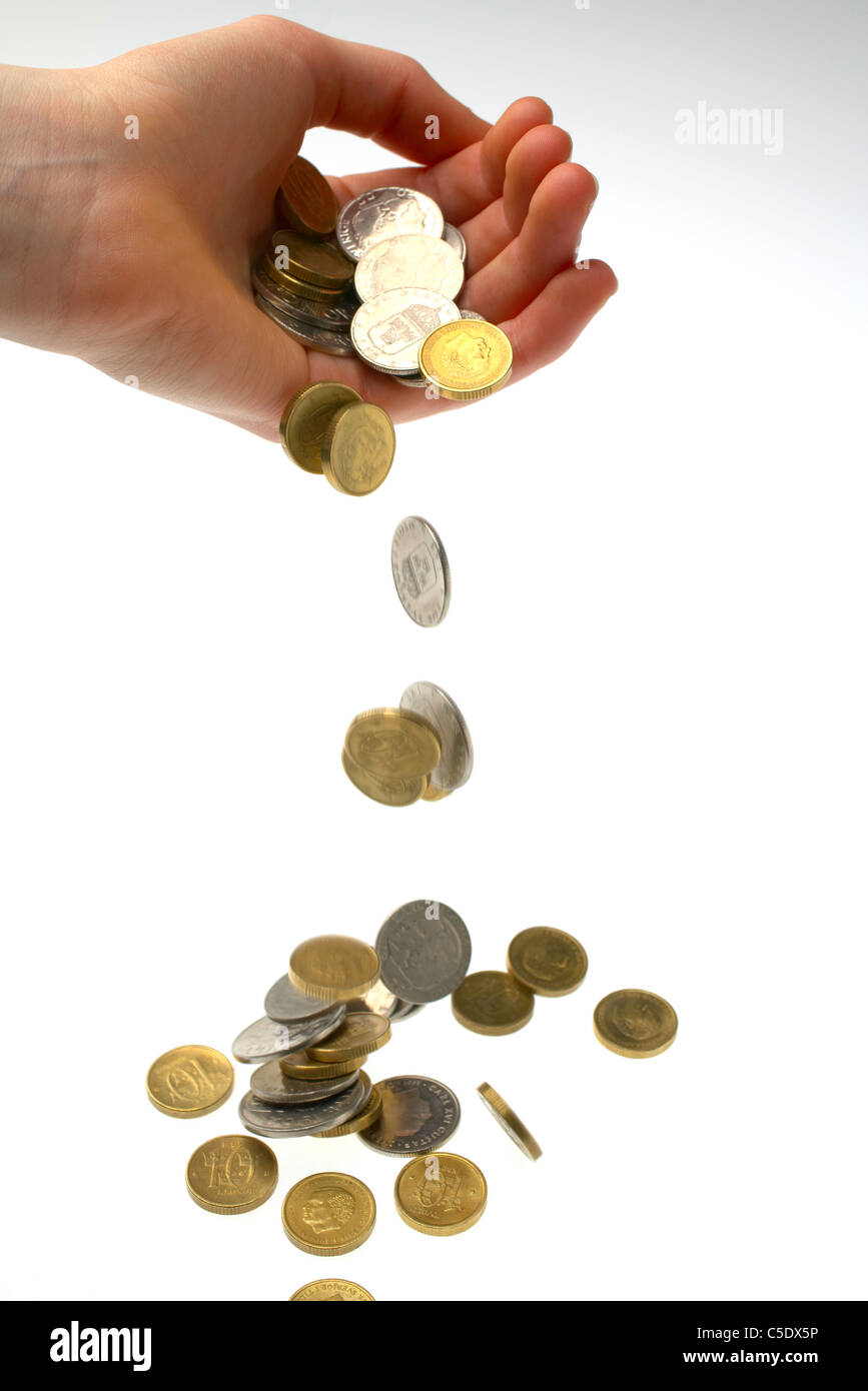 Dropping coins hi-res stock photography and images - Alamy