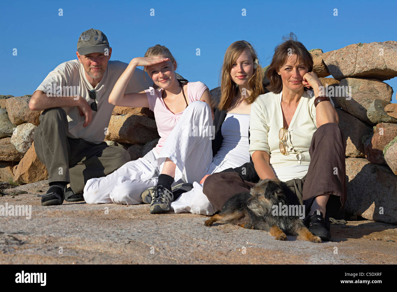 Four sitting hi-res stock photography and images - Alamy