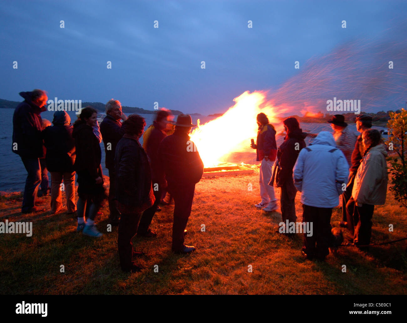 Friends Around Bonfire High Resolution Stock Photography and Images - Alamy