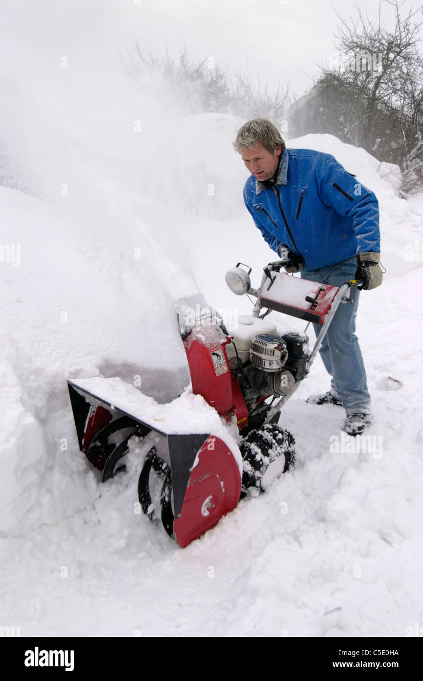 Rotary snow cutter hi-res stock photography and images - Alamy