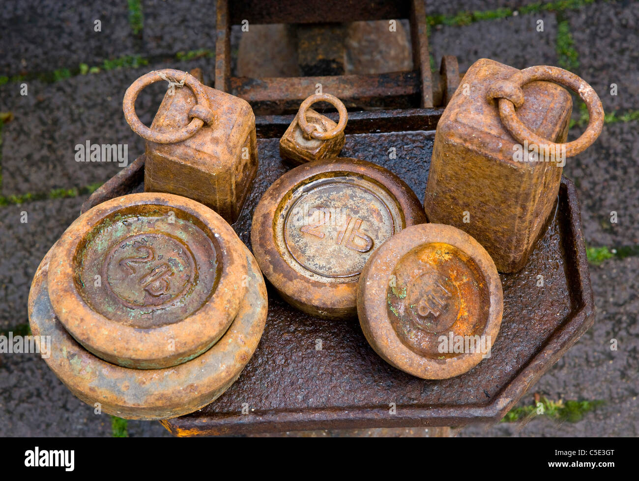 Old weights on scales Stock Photo - Alamy