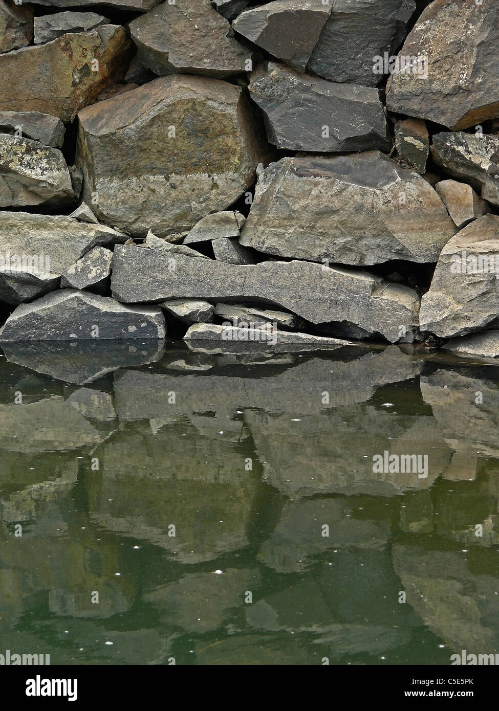 Reflection of Stones in Water Stock Photo - Alamy