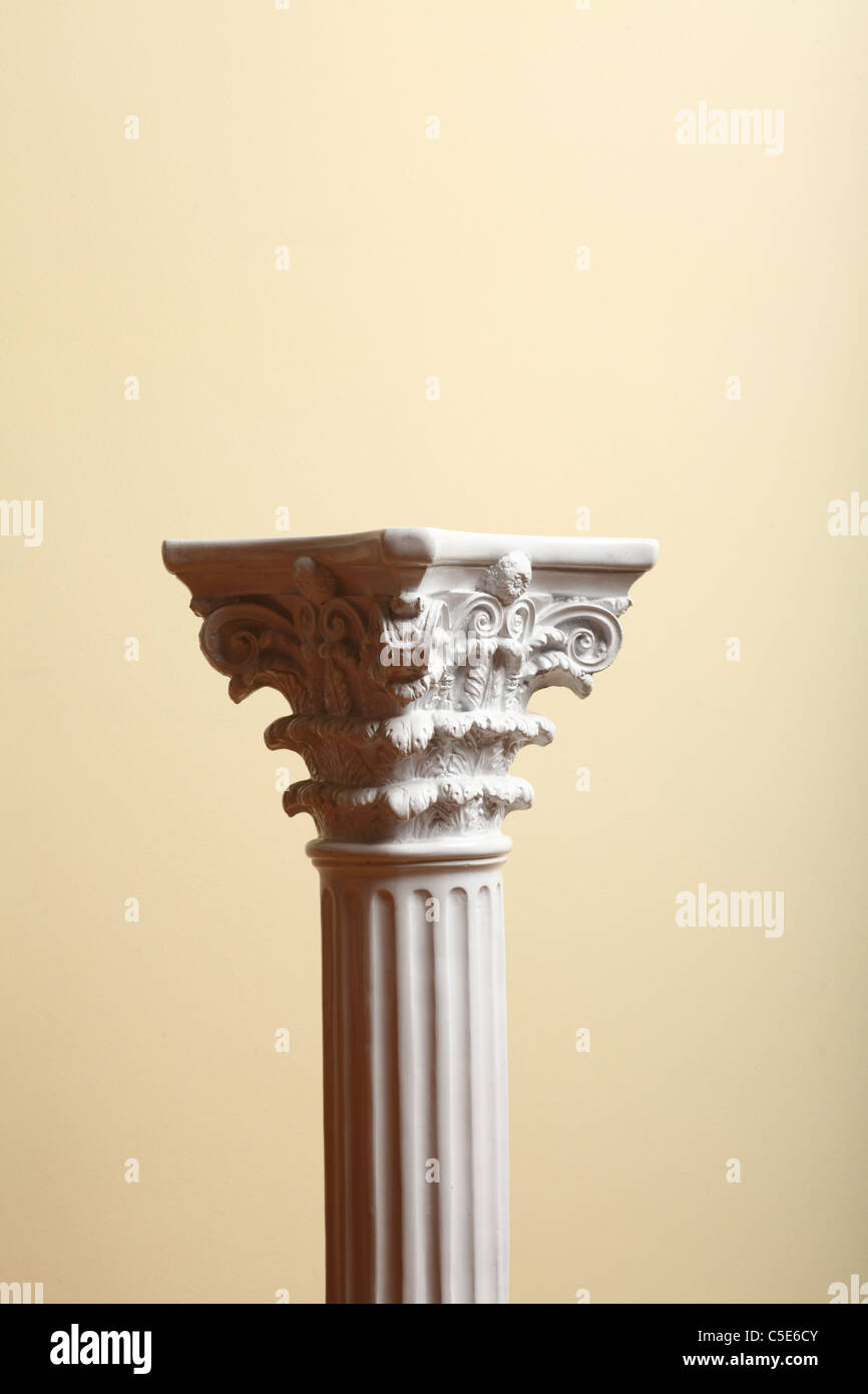 white column indoor on beige background Stock Photo - Alamy