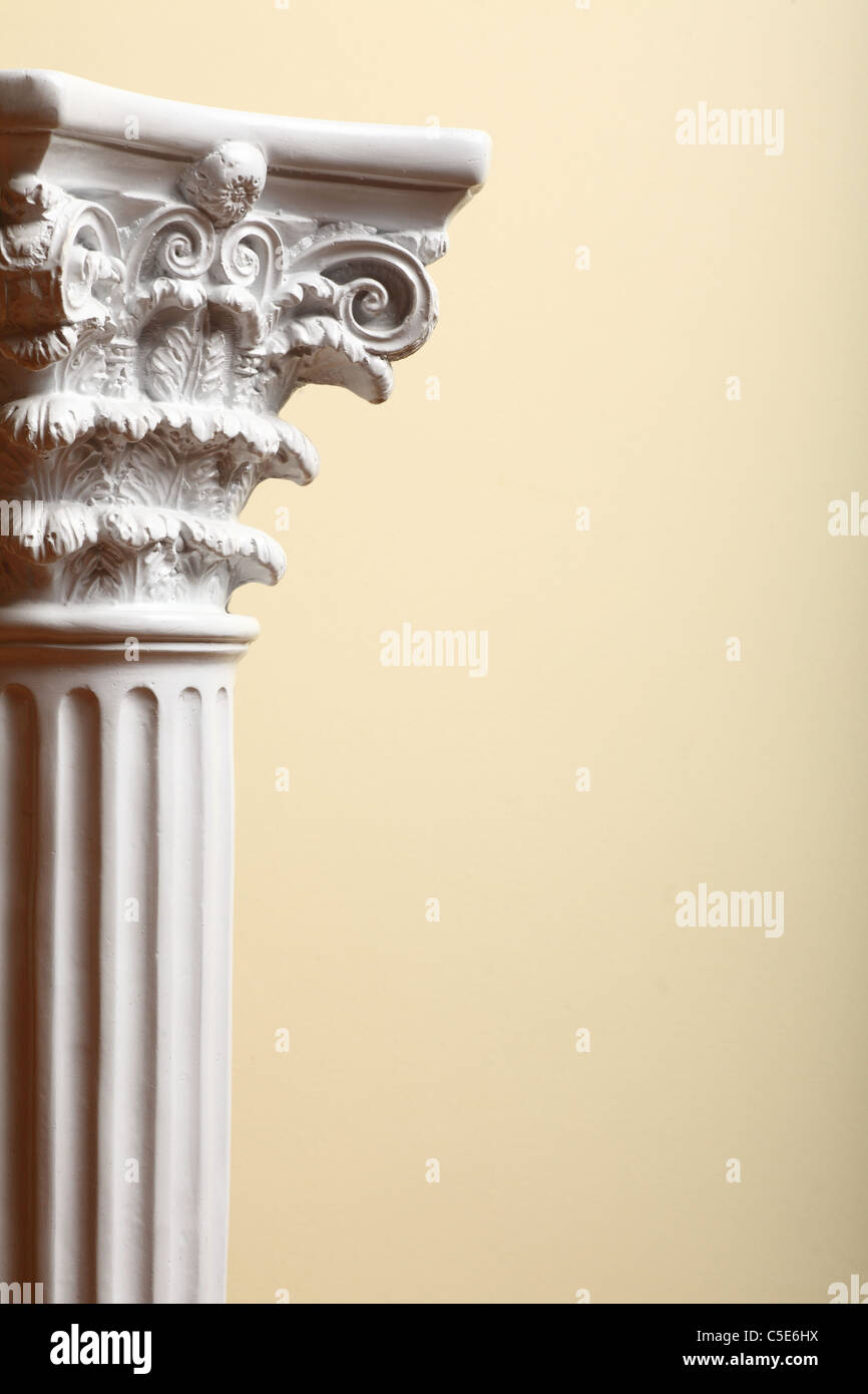 white column indoor on beige background Stock Photo - Alamy
