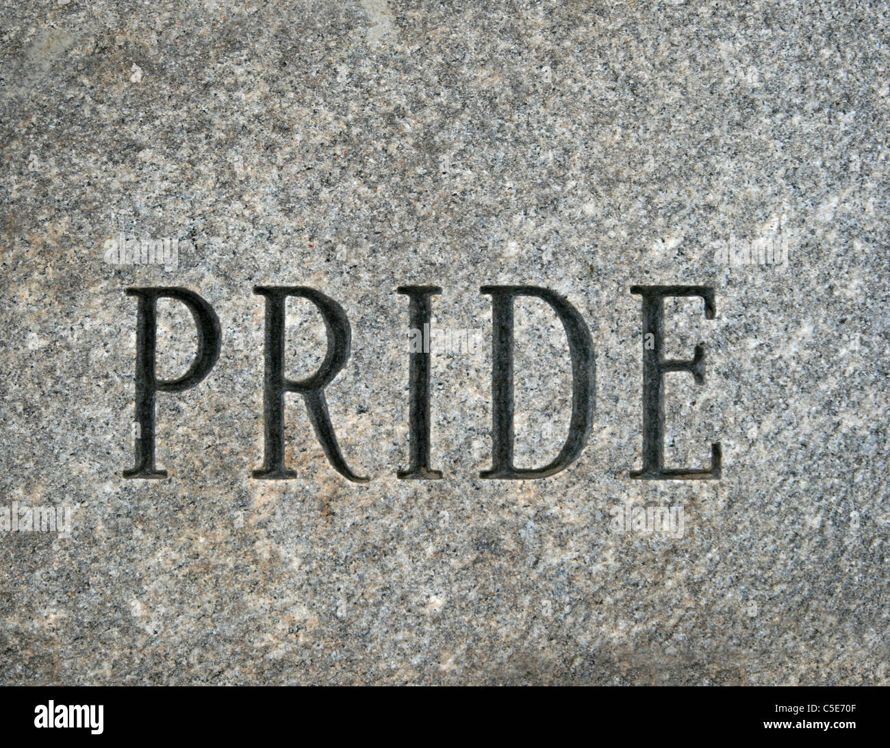 the word pride carved onto a granite cobble stone Stock Photo - Alamy