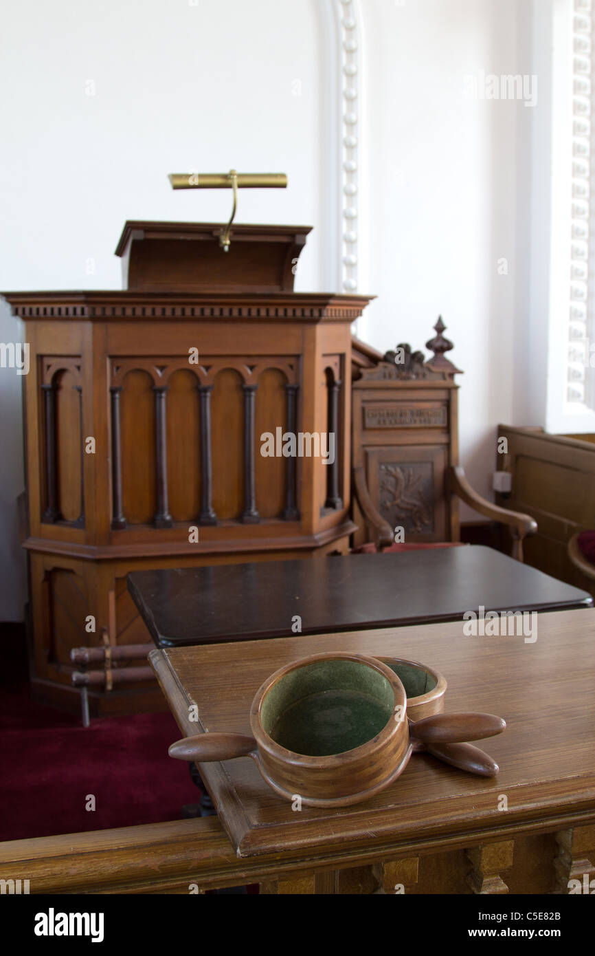 Pulpit and empty collection boxes Stock Photo - Alamy