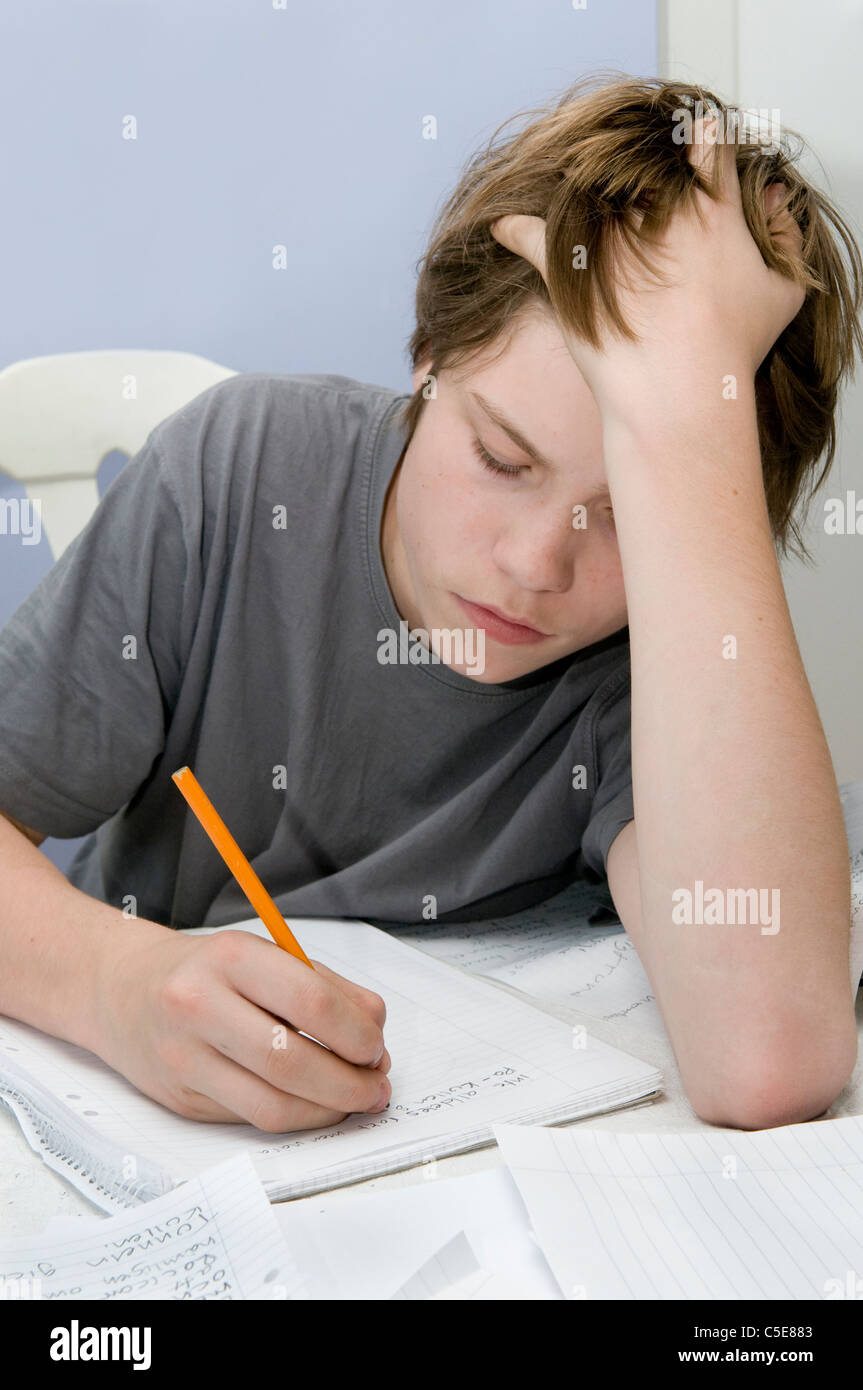 Doing classwork hi-res stock photography and images - Alamy
