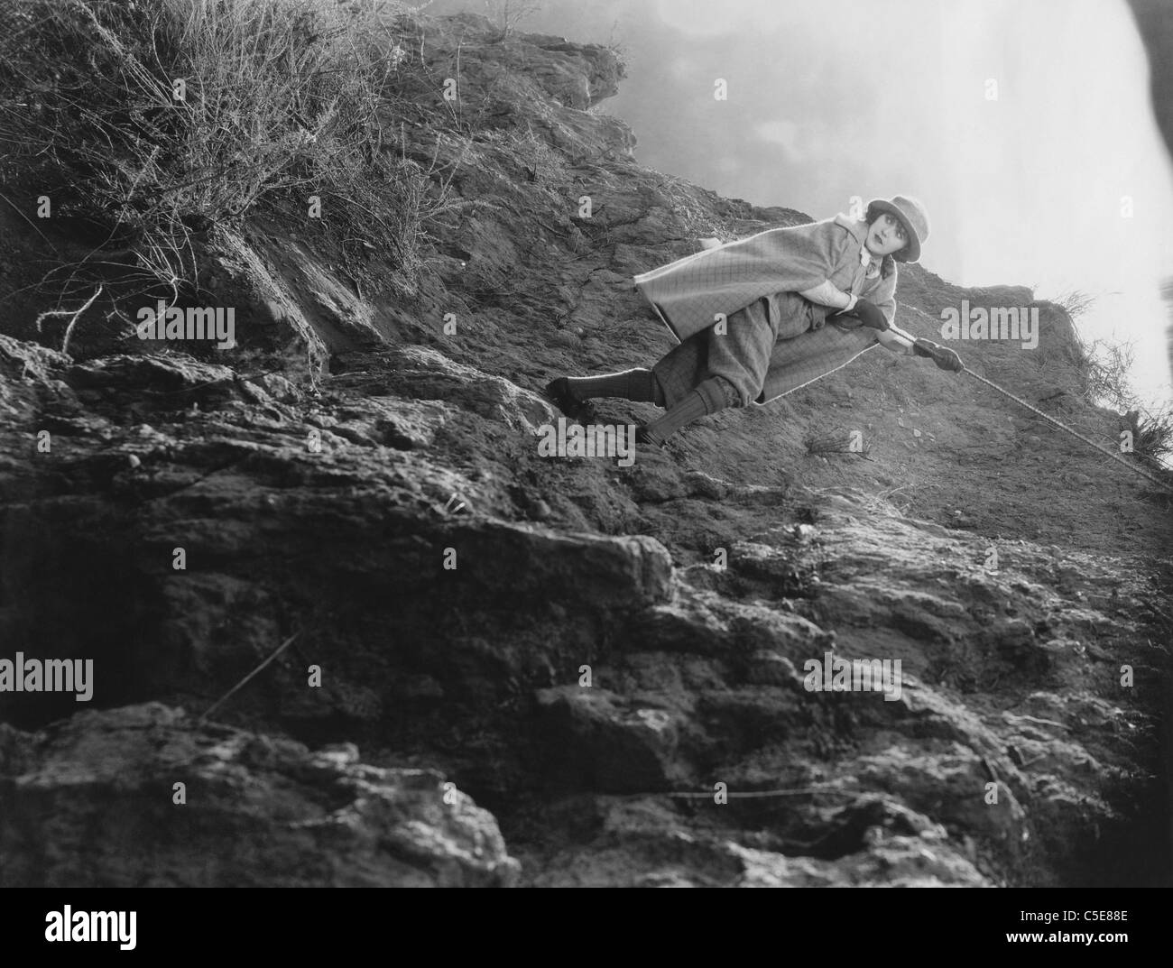 Woman rock climbing scared hi-res stock photography and images - Alamy