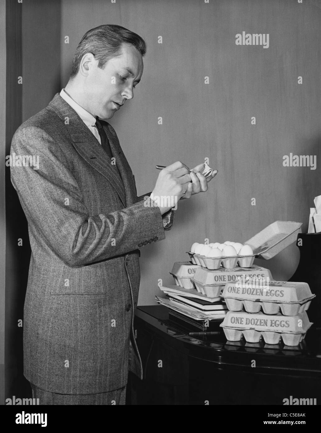 Man taking inventory Black and White Stock Photos & Images - Alamy