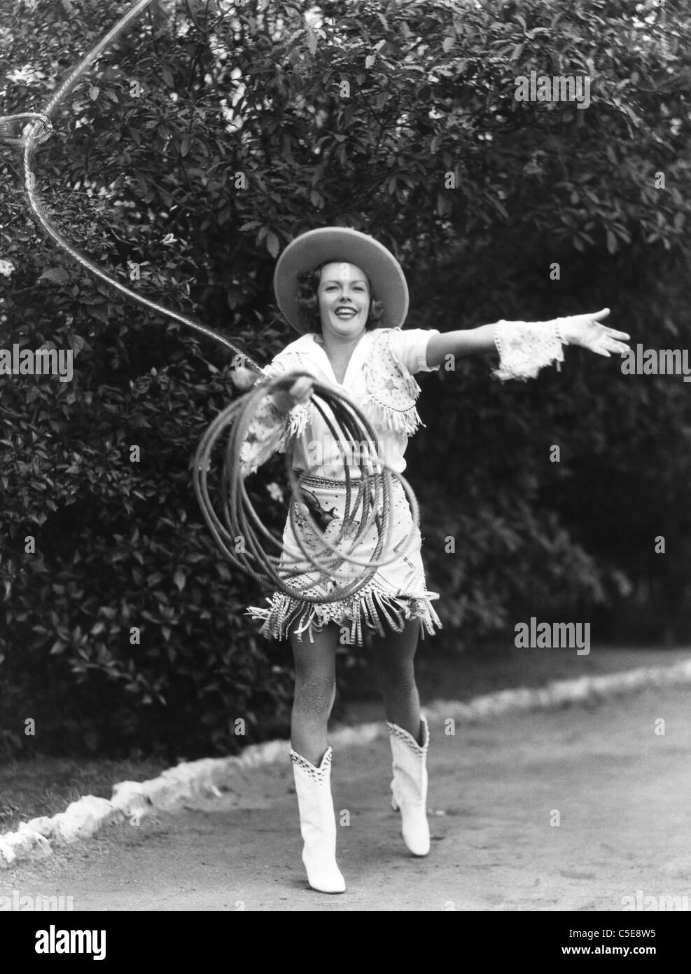 Roping him in Stock Photo - Alamy