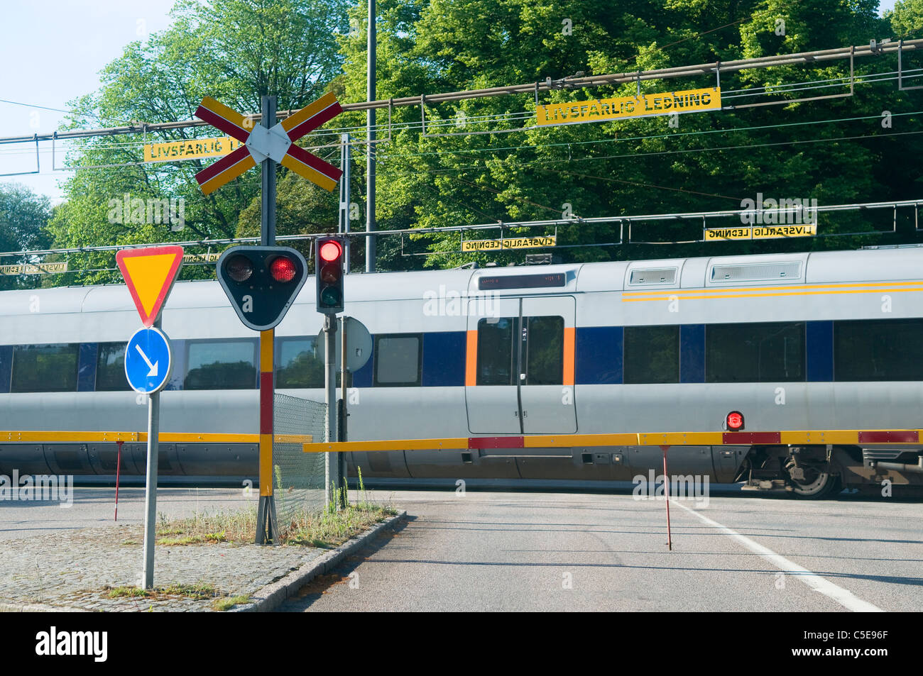 Signs by passenger crossing hi-res stock photography and images - Alamy